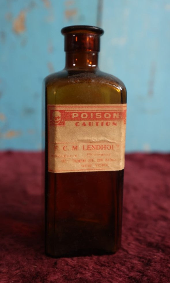 Lot 132 - Antique Amber Glass Bottle With Poison Label From F.C.M Lend ...