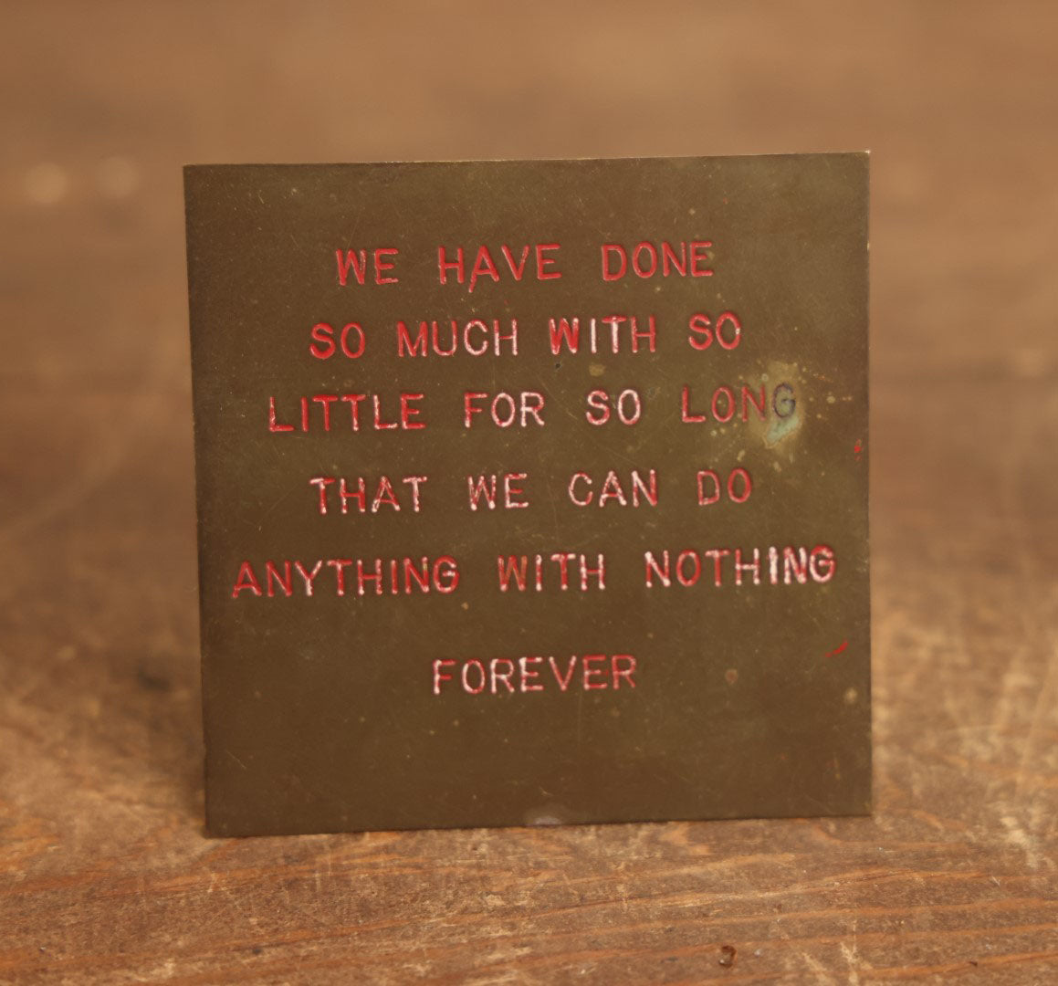 Lot 084 - Vintage Brass And Red Enamel Motto Plaque, "We Have Done So ...