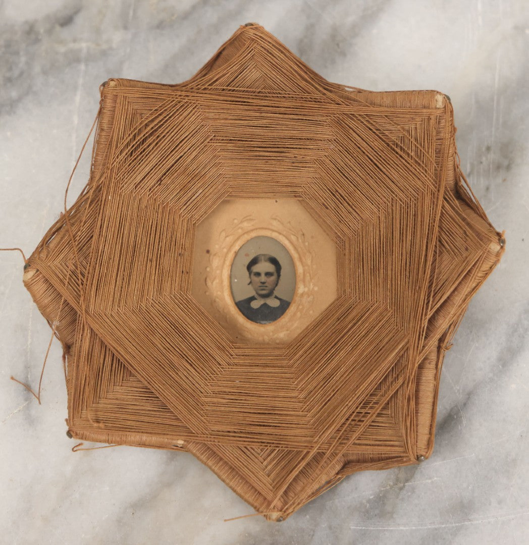 Lot 013 - Antique Folk Art String Frame With Gem Sized Tintype Of Youn ...